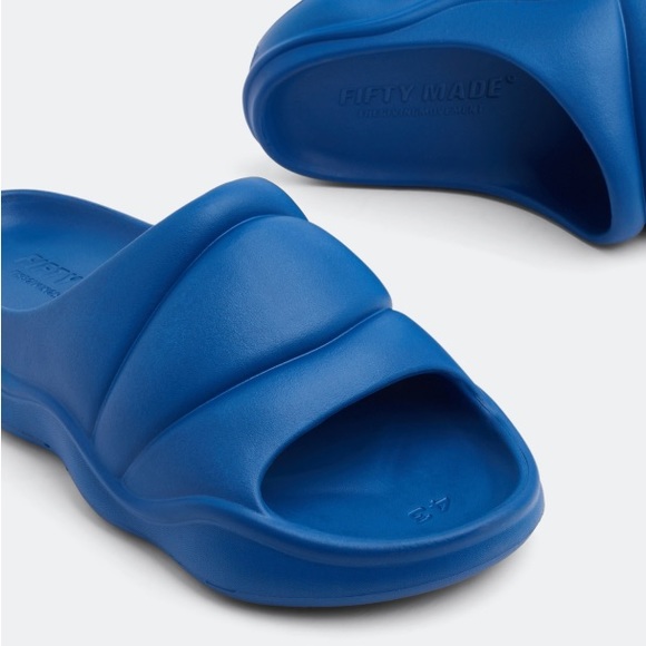 the giving movemen | Shoes | Fifty Made Navy Slides | Poshmark